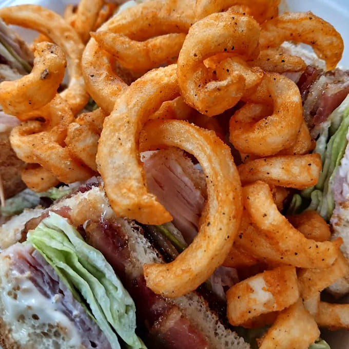 These aren't just curly fries &ndash; they're spiralized potato joy, seasoned with what must be the secret recipe from the flavor gods themselves.