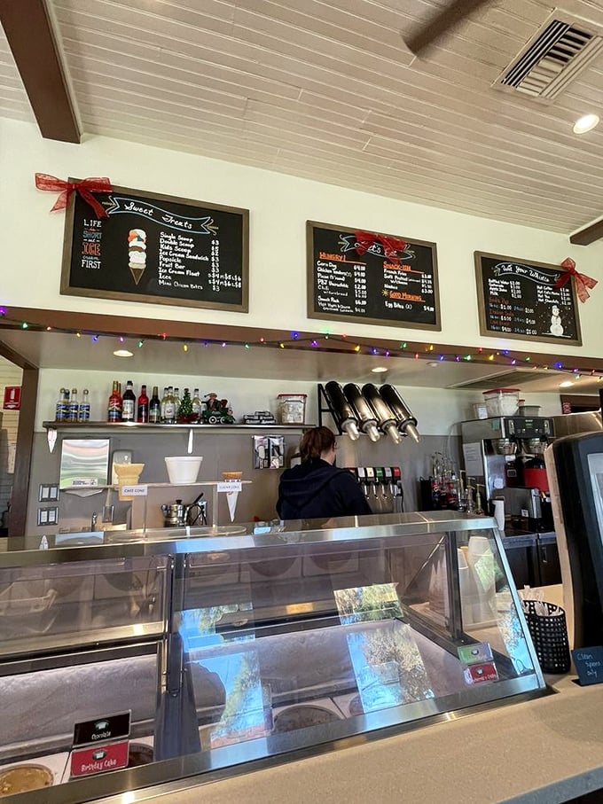 Sweet treats and cold drinks await at the park's snack shop, where refreshment comes with a side of nostalgia under twinkling lights.