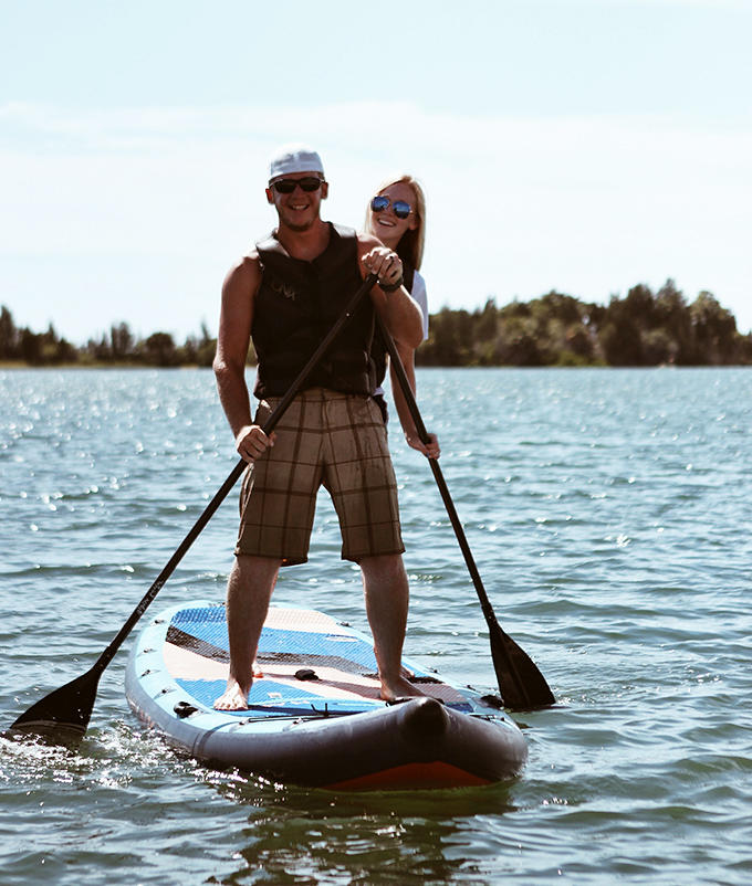 Stand-up paddleboarding: the activity that looks peaceful in photos but actually involves a constant internal monologue of "don't fall, don't fall, don't fall."