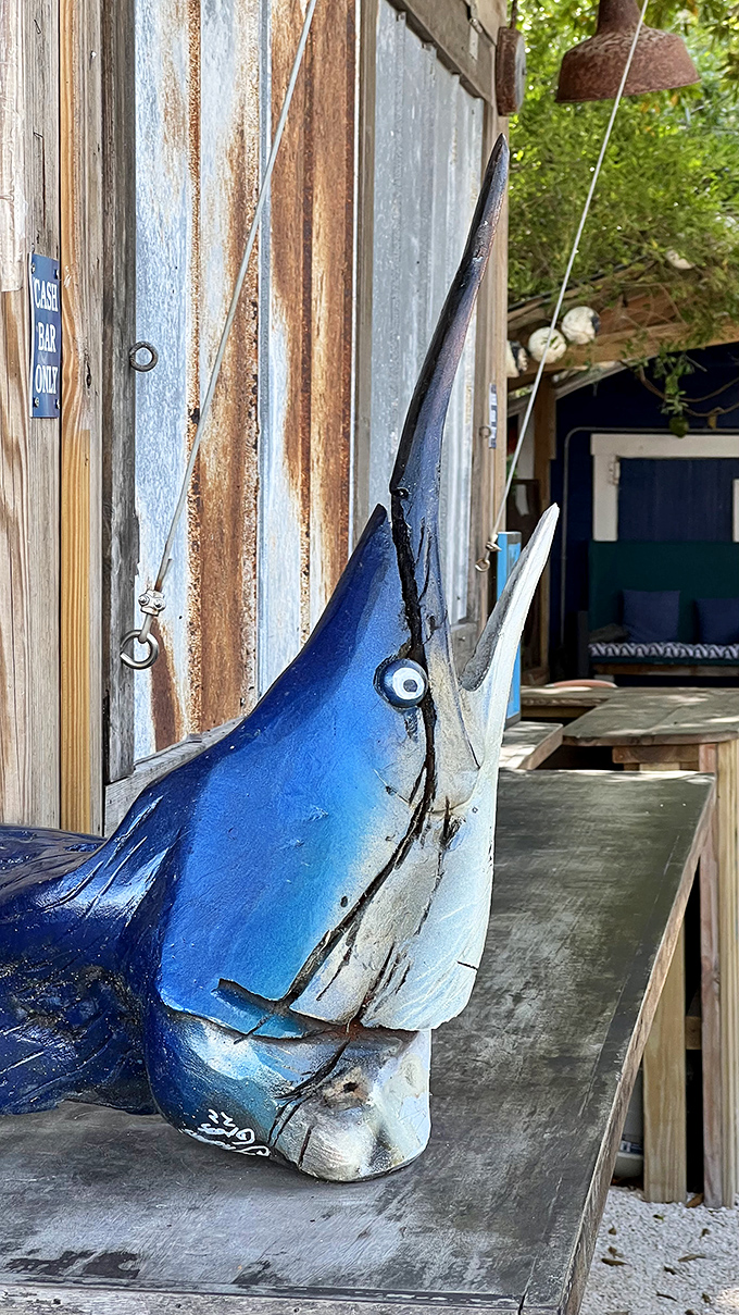 A blue marlin sculpture guards the entrance, setting the maritime tone and practically guaranteeing the seafood inside will be worth the visit.
