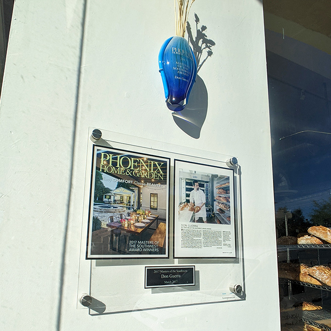 Awards and recognition adorn the wall, though the real achievement is the daily miracle of transforming simple ingredients into edible art.