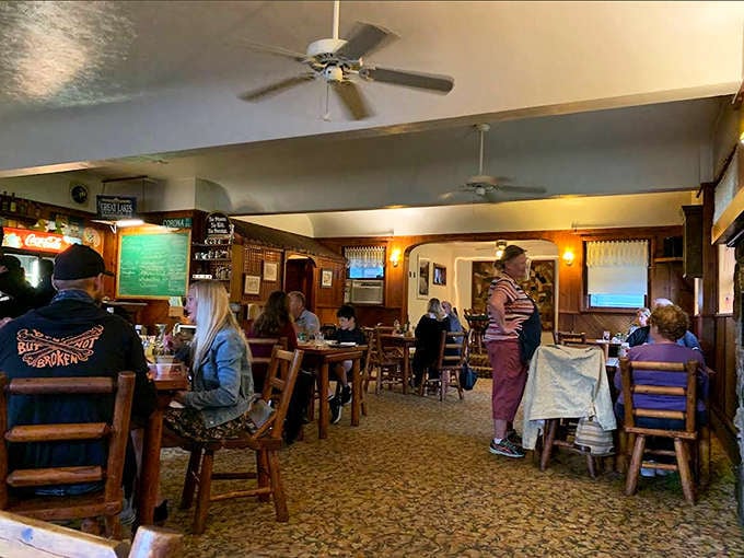 The dining room hums with the symphony of clinking glasses and satisfied murmurs as diners experience food worth driving to Au Train for.