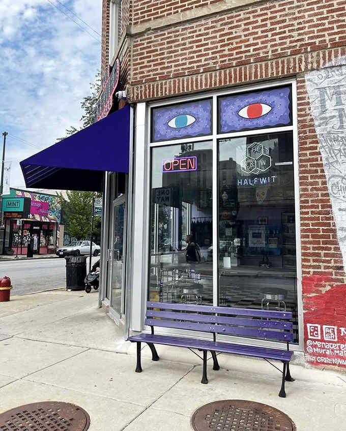 The Brewed's distinctive purple storefront with its watchful mismatched eyes creates an unmistakable presence on Chicago's vibrant Clark Street.