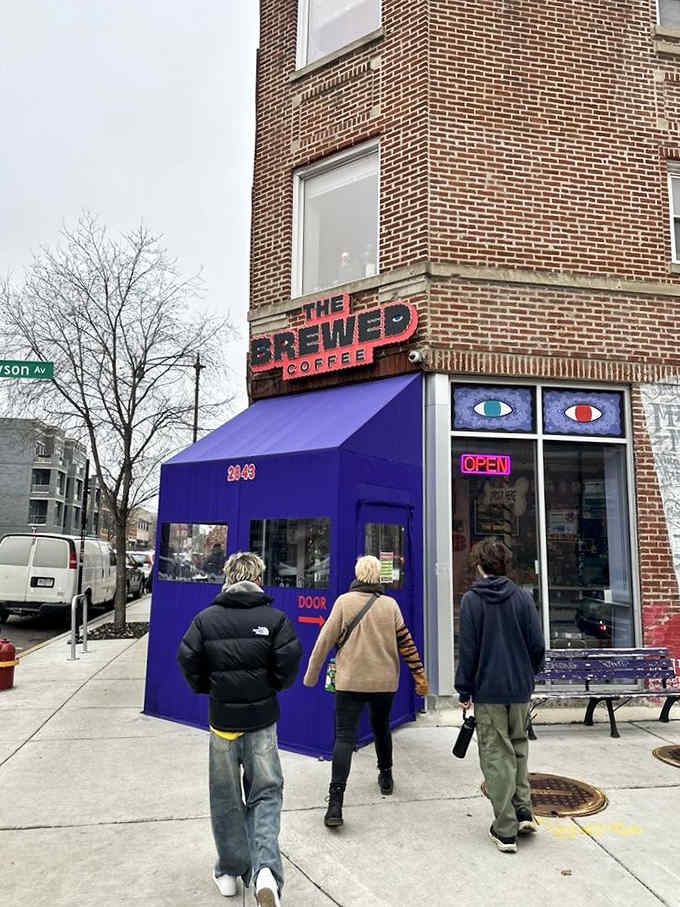 Winter visitors brave the Chicago cold to enter The Brewed's purple sanctuary of strange art, exceptional coffee, and conversation-starting decor.