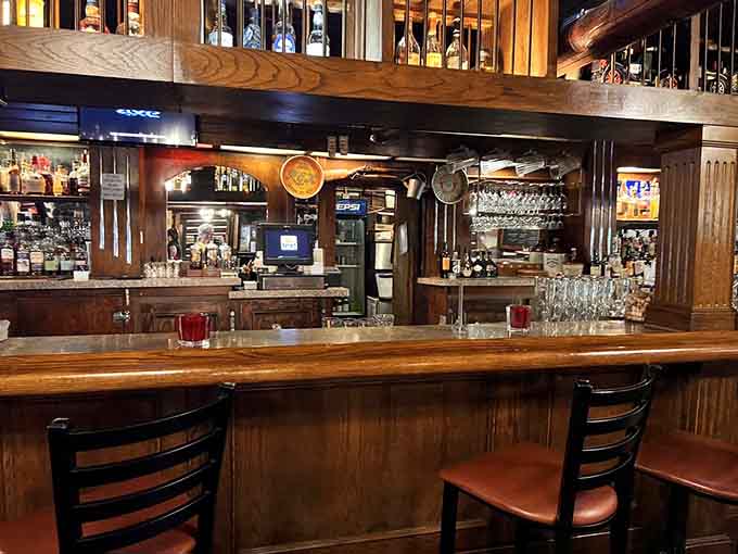 The well-stocked bar area invites you to settle in with a drink while you wait for your table.