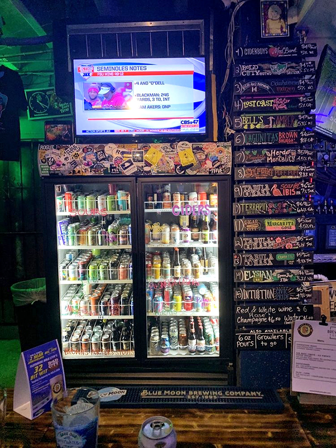 The bar area serves as command central, where craft beer flows and gaming strategies are shared between rounds of digital combat.