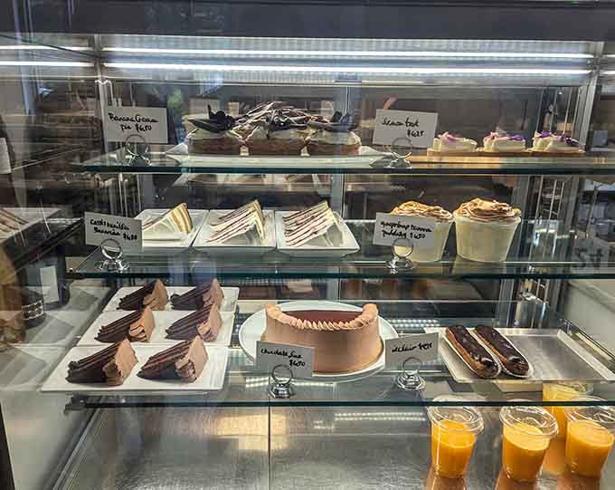 The dessert case displays sweet temptations like jewels, each one crafted with the kind of care that shows in every bite.