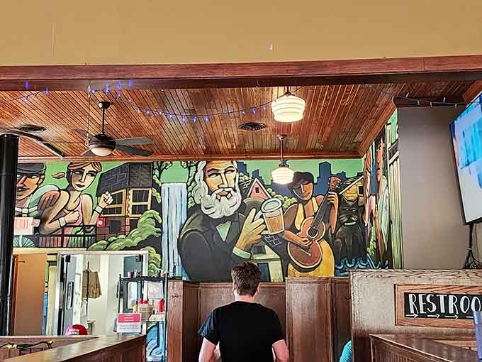 This vibrant mural captures the spirit of the place: good times, good drinks, and good company all coming together.