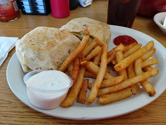 Wrapped tighter than holiday presents, this burrito brings together flavors that make you wonder why you'd ever need fancy cuisine.