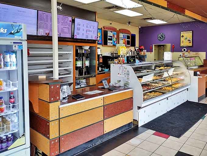 Where the magic happens &ndash; the counter at Caf&eacute; Donuts, where friendly staff turn donut dreams into sweet reality.