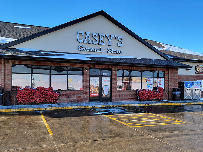 Every small town needs its Casey's &ndash; part convenience store, part community hub, all Midwestern institution. Those firewood stacks say "winter's coming."