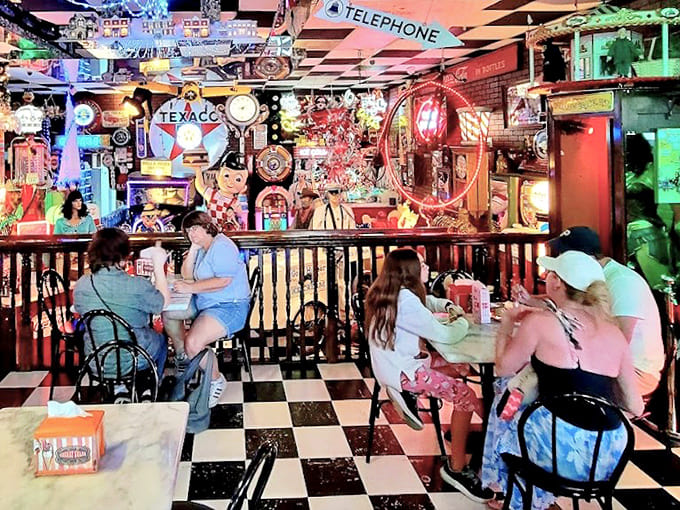 The checkered floor anchors the space while diners float away on sugar clouds &ndash; notice nobody's looking at their phones?
