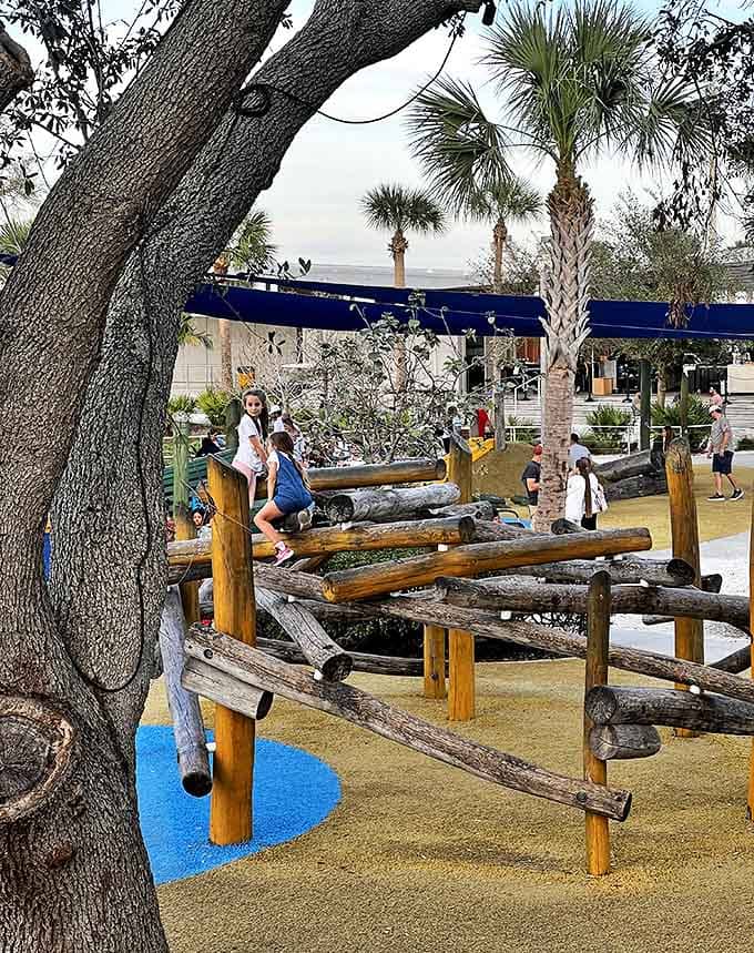 Nature meets playground engineering in this log climbing structure &ndash; like an obstacle course designed by friendly beavers with degrees in child development.