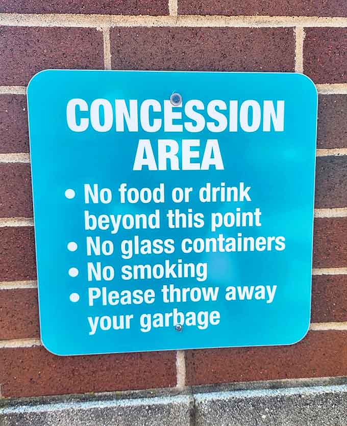 This concession area sign lays down the law with rules that basically translate to "don't be that person who ruins it for everyone."