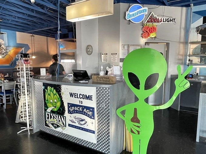The welcome desk features an alien greeter whose enthusiasm for Earthling visitors rivals that of a puppy seeing its owner after five minutes.