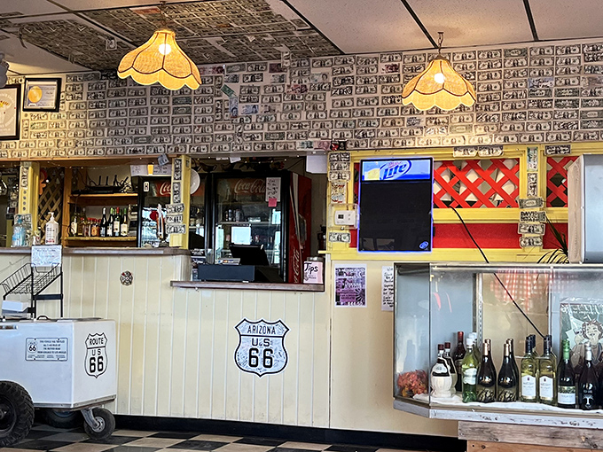 Dollar bills papering the walls tell stories of travelers past &ndash; each one a testament to meals worth remembering and experiences worth documenting.