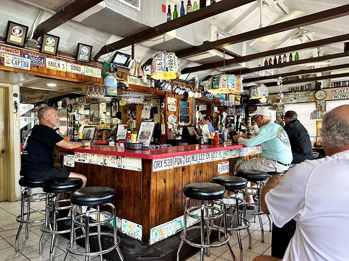 The heart of Mrs. Mac's social scene &ndash; where locals and tourists trade stories across a bar decorated with decades of travel memories.