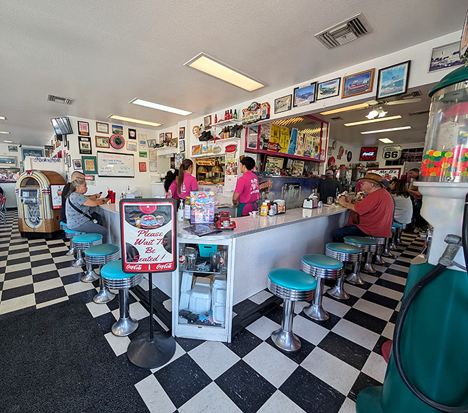 Counter seating offers front-row views to the culinary choreography happening in the kitchen.