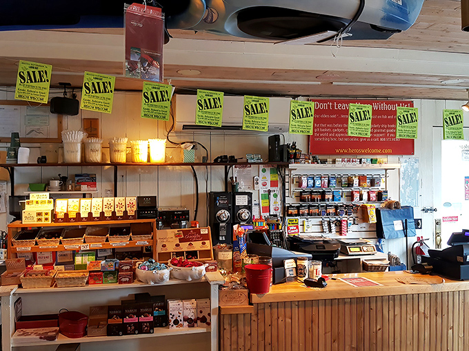 The checkout counter brims with treats and bright sale signs, adding cheerful energy to this busy general store.