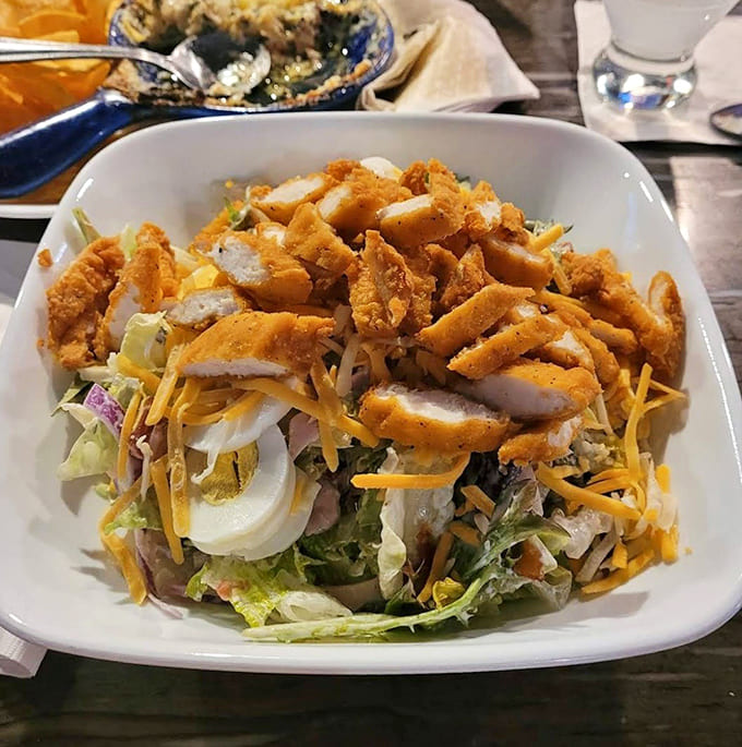 Country fried chicken transforms a salad into something actually exciting, because sometimes greens need a crispy, golden intervention.