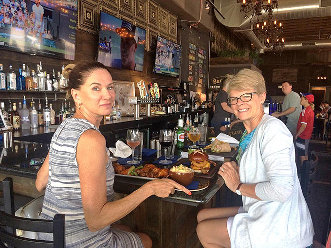 Happy diners enjoying the kind of meal that creates memories, or at least really good Instagram content for later.