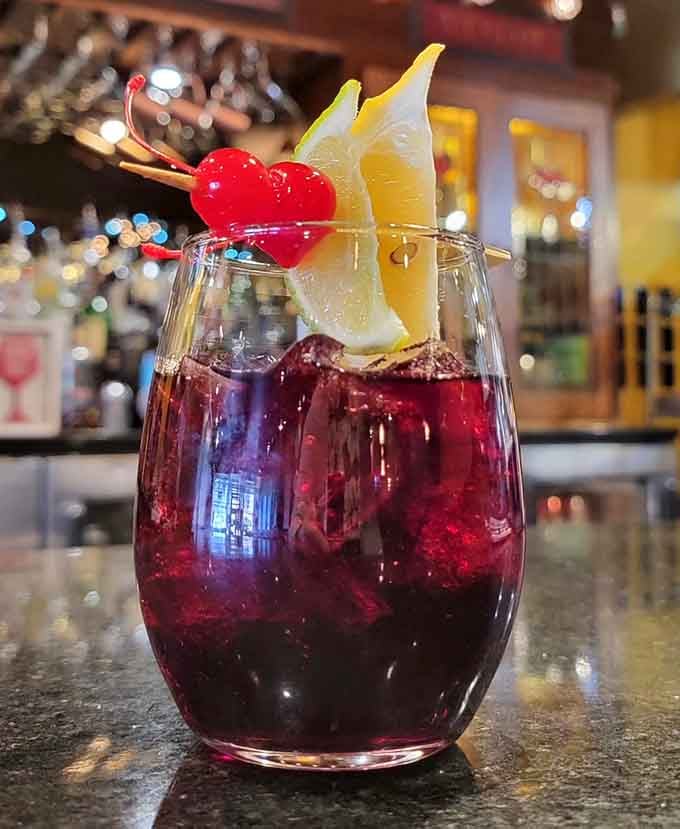 Red wine sangria garnished with fruit, making hydration feel like a celebration in a glass.