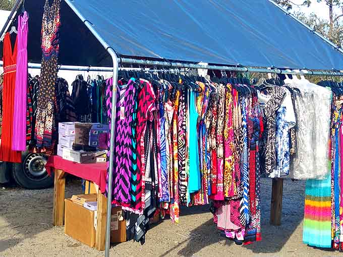 A rainbow of fabrics sways gently in the Florida breeze, each dress holding the promise of becoming someone's perfect vacation outfit.