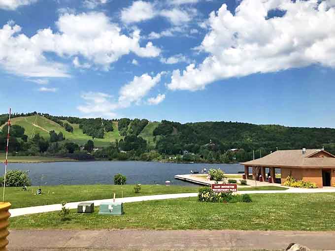 East Houghton Waterfront Park: Mirror-calm waters create perfect reflections of autumn's glory, doubling the visual feast for lucky visitors.