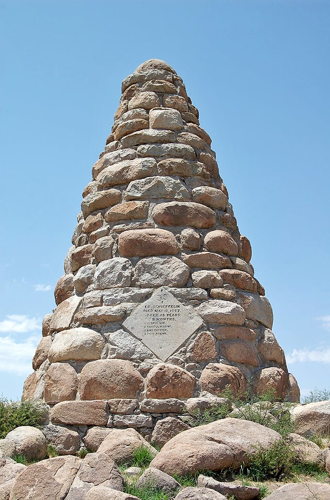 This stone monument stands as a silent sentinel in the desert, commemorating the prospector whose silver discovery transformed Tombstone from empty land to boomtown overnight.