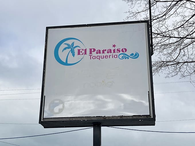The El Paraiso sign stands as a beacon for those in the know – a simple promise of authentic flavors waiting just beyond those doors.