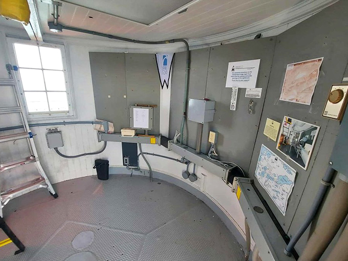 Inside the lighthouse, utilitarian design meets maritime function in the electrical room, where modern technology now handles what keepers once managed manually.