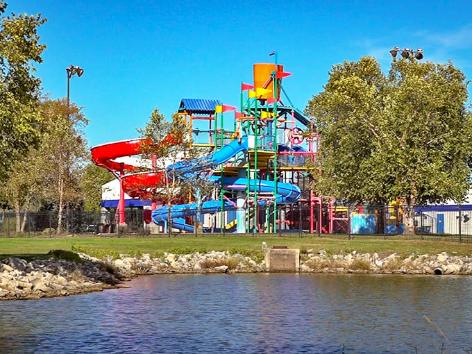 Waterslides rise like colorful serpents against the sky, their twisting paths promising moments of weightless wonder.