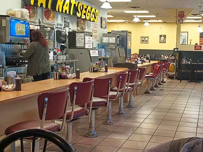 Counter seats offer front-row views to the breakfast ballet happening in that impressively efficient kitchen.
