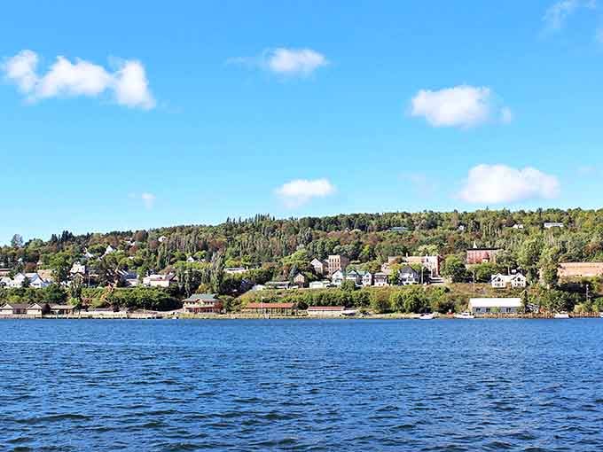 Houghton's waterfront setting creates a postcard-perfect scene, where hillside homes cascade down to meet the shimmering blue of Portage Lake.