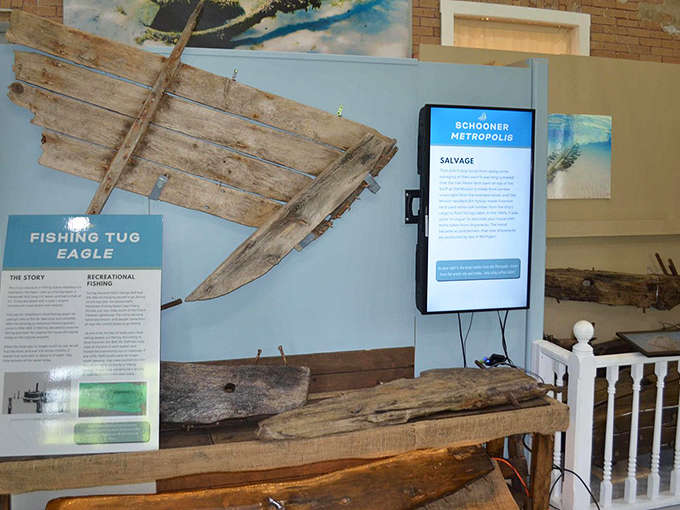 Weathered wooden remnants of the fishing tug Eagle tell silent stories of the commercial fishing industry that once thrived in these waters.