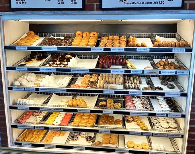 The display case at Fray's isn't just storage &ndash; it's a museum of fried dough artistry. Each shelf tells a different chapter in the story of breakfast indulgence.