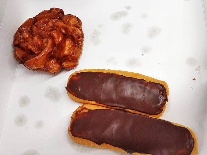 The dynamic duo of pastry perfection &ndash; a craggy, apple-studded fritter alongside chocolate eclairs that would make a French baker tip his hat.