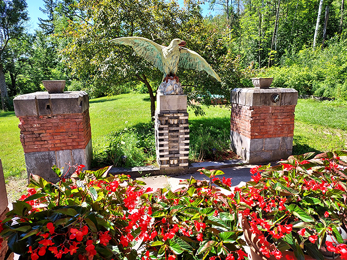 This eagle statue standing guard in the garden looks ready to swoop down on unsuspecting tourists who dare to step on the flower beds.
