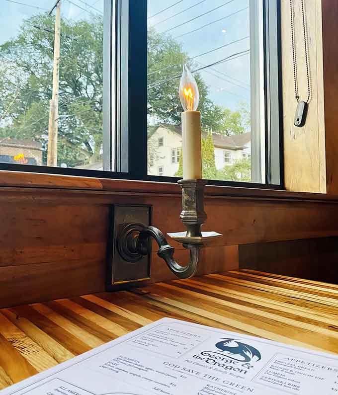 Even the lighting fixtures have character here, with candle-shaped bulbs adding old-world charm to this modern neighborhood gathering spot.