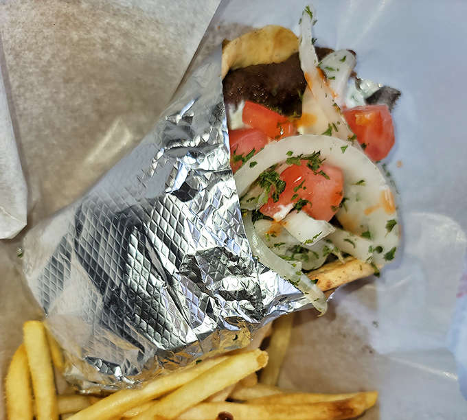 The gyro &ndash; a Mediterranean marvel wrapped in foil, bursting with seasoned meat, fresh vegetables, and tzatziki sauce that provides a delicious detour from hot dogs.