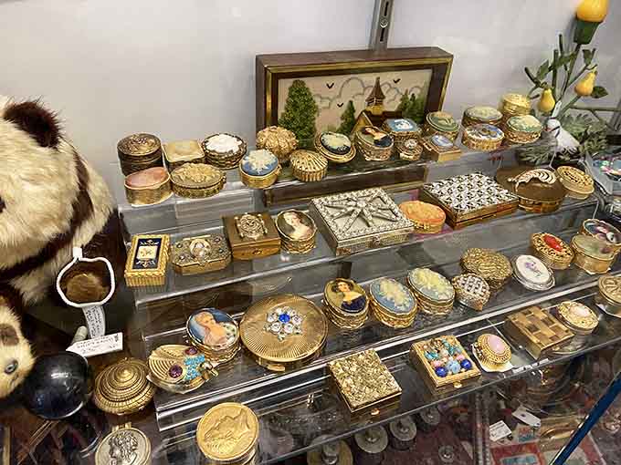 Ornate trinket boxes line the shelves like tiny treasure chests, each one begging to hold someone's most precious small possessions.