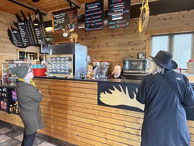 The counter where magic happens, staffed by friendly baristas who treat coffee-making like the serious art form it is.