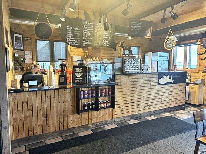 The pine-clad counter where coffee magic happens &ndash; baristas craft drinks with practiced precision and genuine North Shore friendliness.