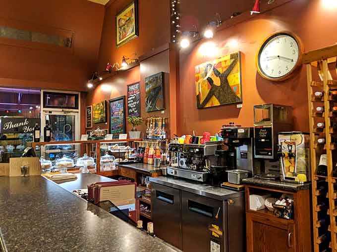 The bar area where espresso machines and wine bottles coexist in caffeinated, fermented harmony.