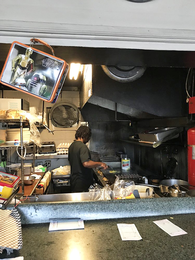 Where the magic happens! The kitchen may be compact, but it produces breakfast masterpieces that keep locals coming back for more.