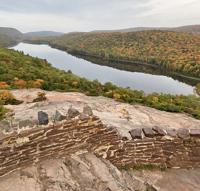Lake of the Clouds reveals why it earned its poetic name, cradled between ancient ridges and reflecting the sky like a mirror.
