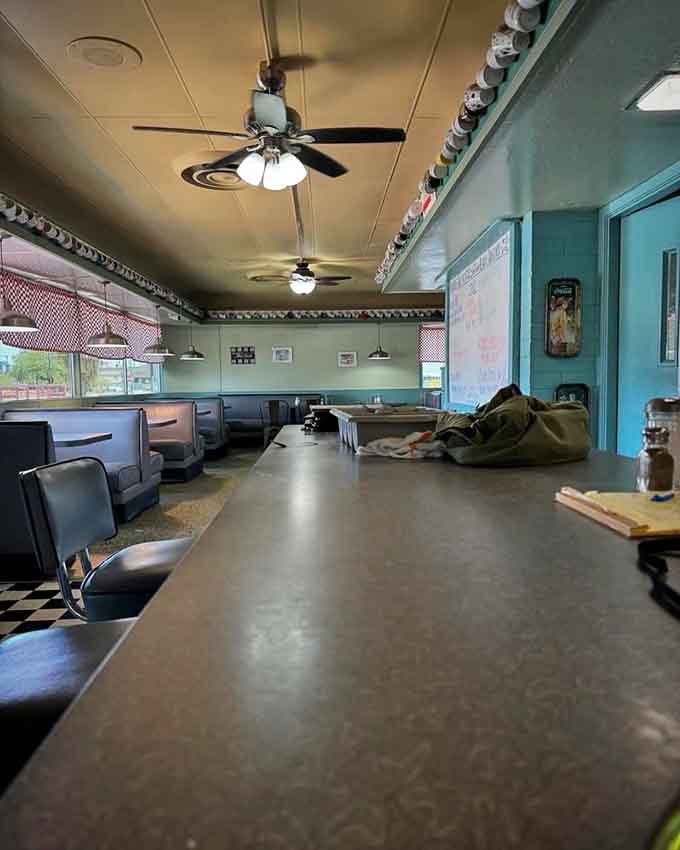 Counter seating offers front-row views of the kitchen action, perfect for solo diners who appreciate watching their meal come together.