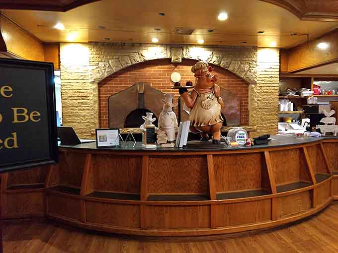 Even the reception area radiates warmth and hospitality, setting the tone for the delicious experience ahead with playful pig decor.