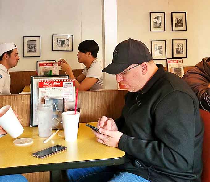 Real people enjoying real food in real booths &ndash; no influencers staging photos, just genuine satisfaction.