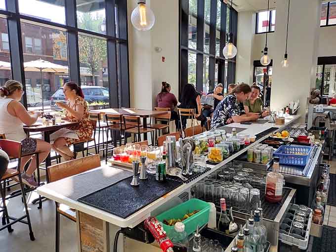 The bar area gleams with possibility, ready to craft your perfect cocktail or pour that glass of wine that'll pair beautifully with your meal.